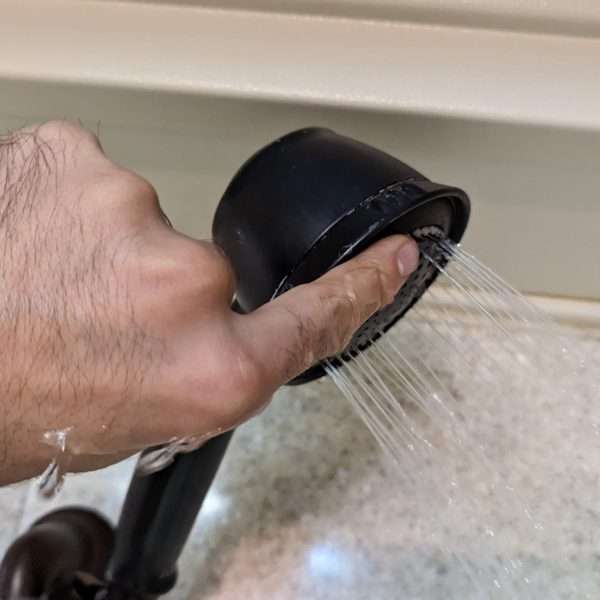 The Secret Way to Clean Your Shower Head Without Removing It